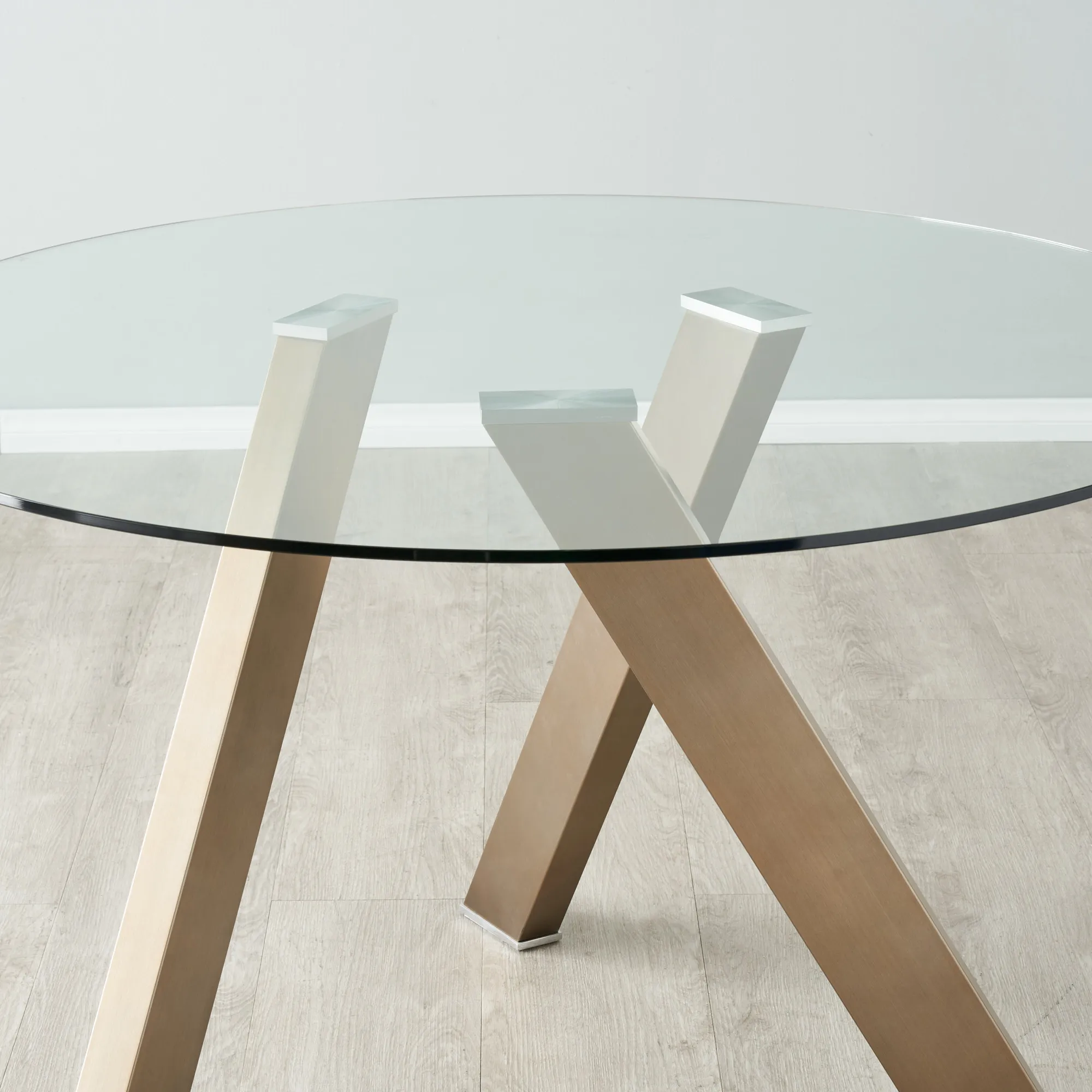 Jutta Glass 120cm Dining Table - Antique Brass Colour Legs