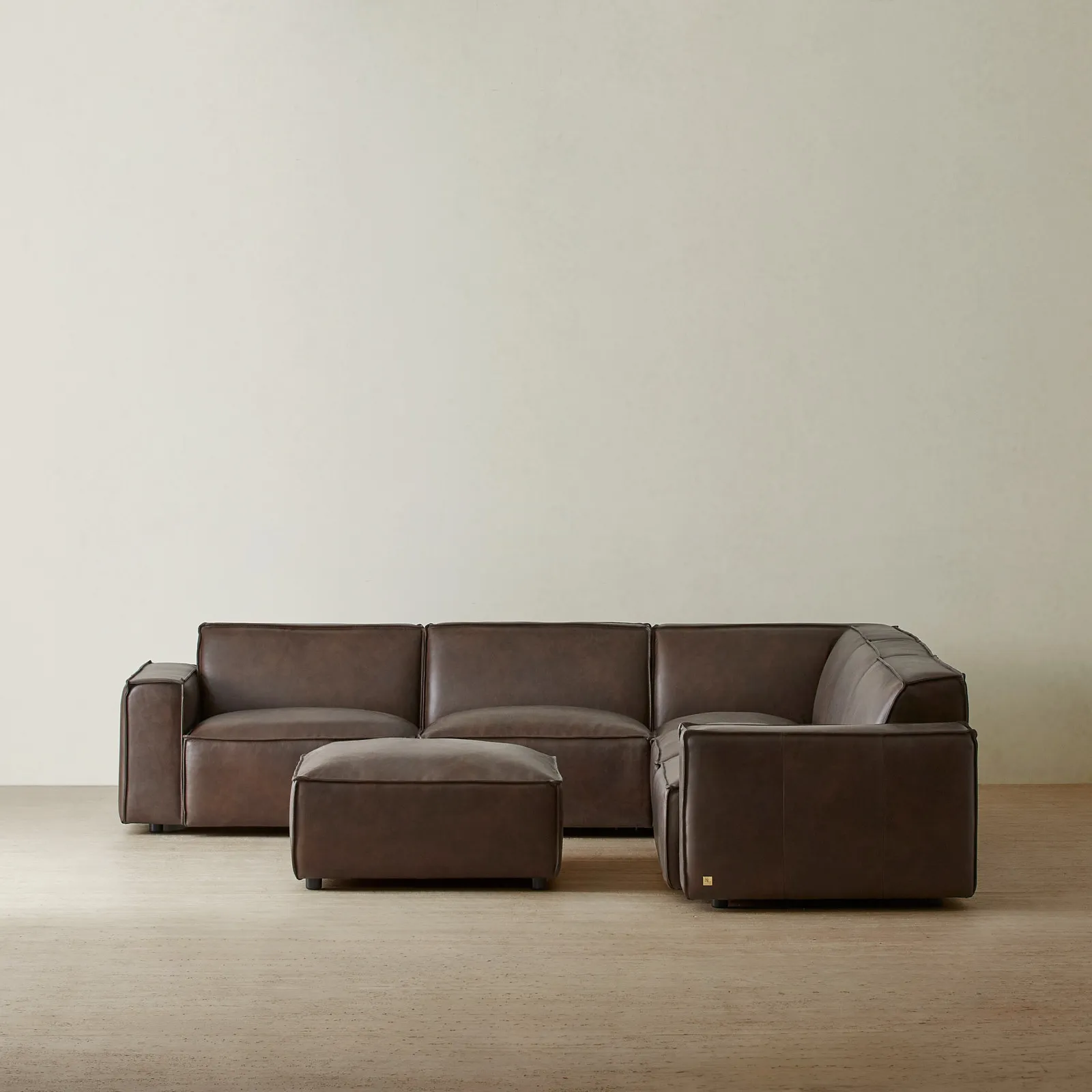 Lainey Chocolate Brown Modular Leather Sofa with Ottoman | Koala Living